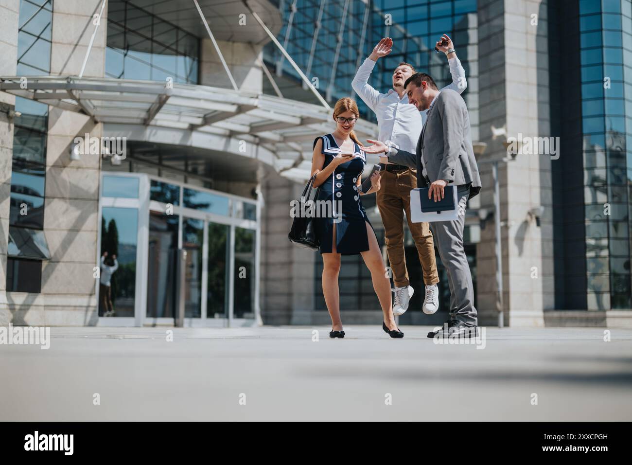 Team excited businesspeople jumping hi-res stock photography and images ...