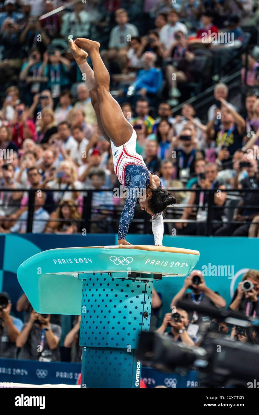 Simone Biles USA) competes on the vault during the Women's Gymnatics ...