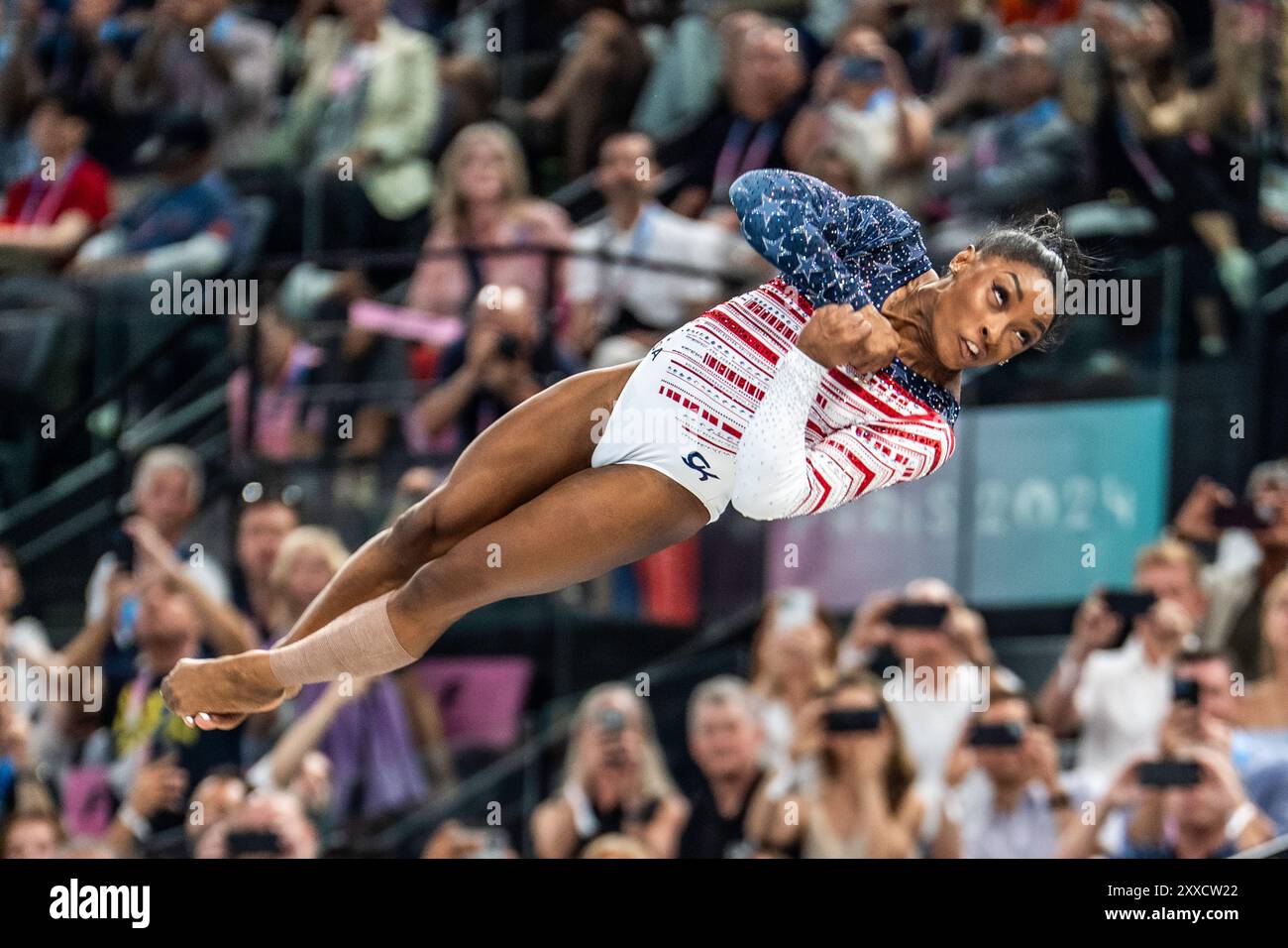 Simone Biles USA) competes on the vault during the Women's Gymnatics ...