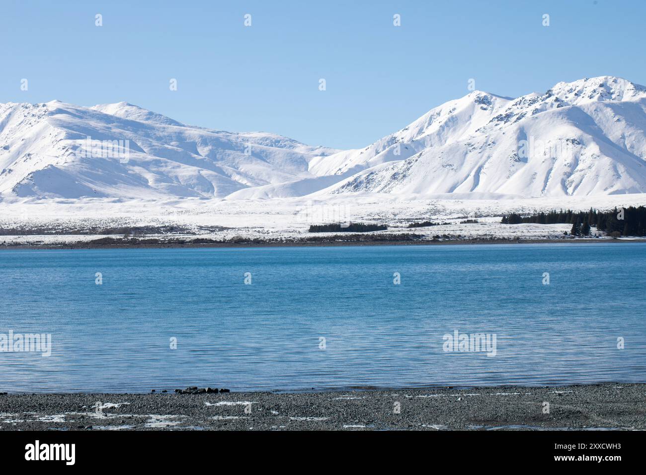 Lake Tekapo in New Zealand in winter. Stunning view of the snow-capped ...