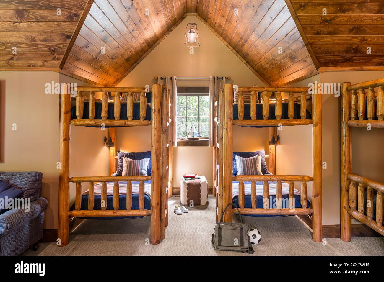 Bunk room with multiple bunkbeds in northwoods cabin Stock Photo - Alamy