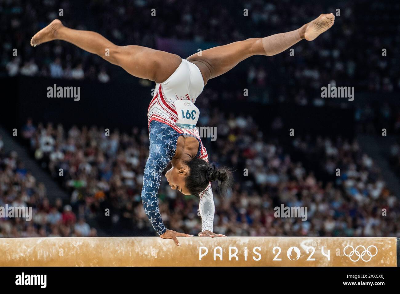 Simone Biles USA) competes on the balance beam during the Women's ...