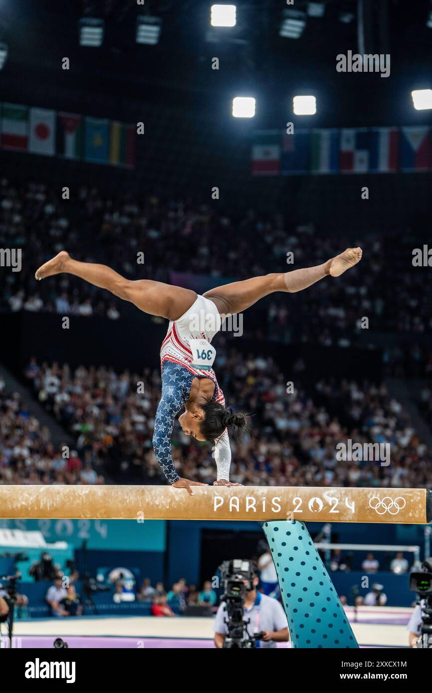 Simone Biles USA) competes on the balance beam during the Women's ...