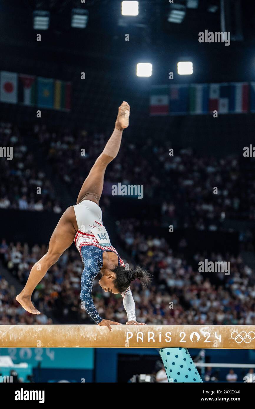 Simone Biles USA) competes on the balance beam during the Women's ...