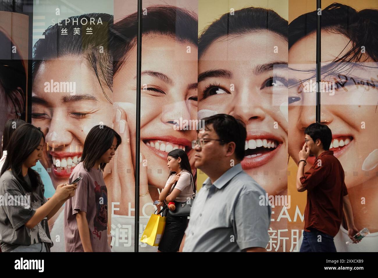 BEIJING, CHINA - AUGUST 18, 2024 - People visit Taikoo Li, a trendy ...