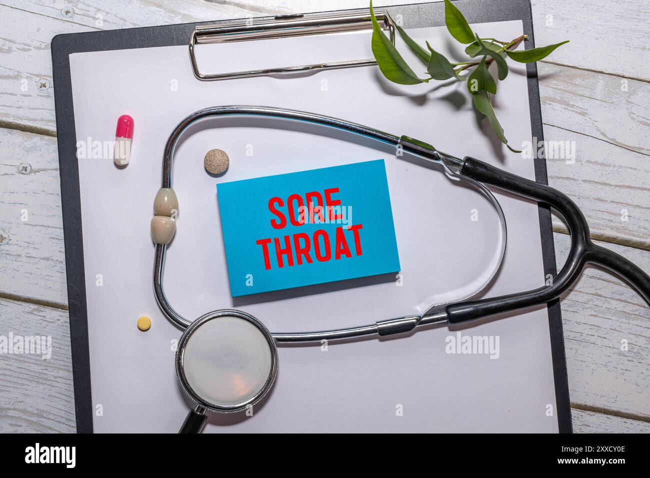 SORE THROAT text written on the paper with stethoscope. Medical concept ...