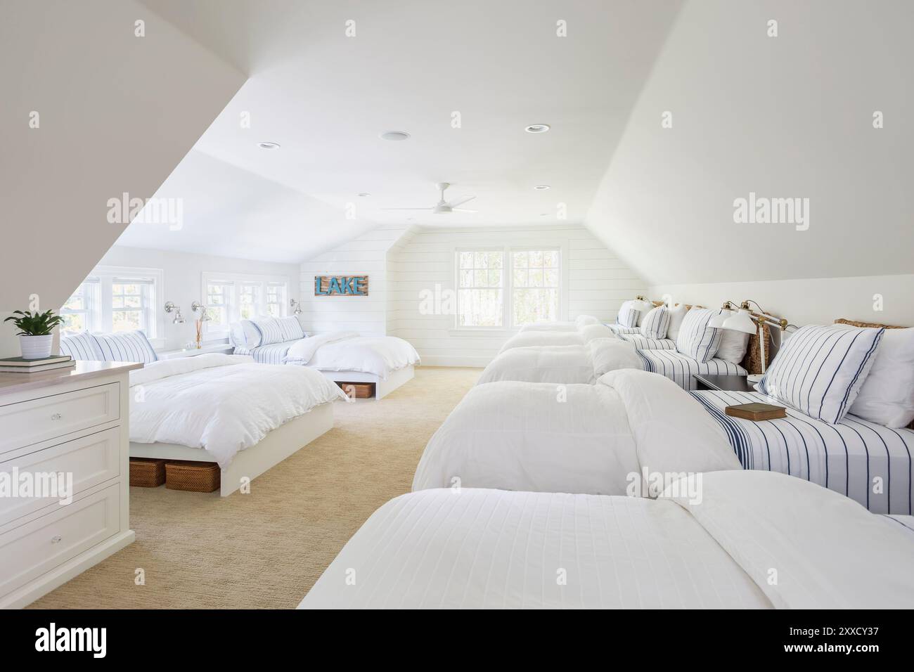Seven beds in large bunk room for multiple people hi-res stock ...