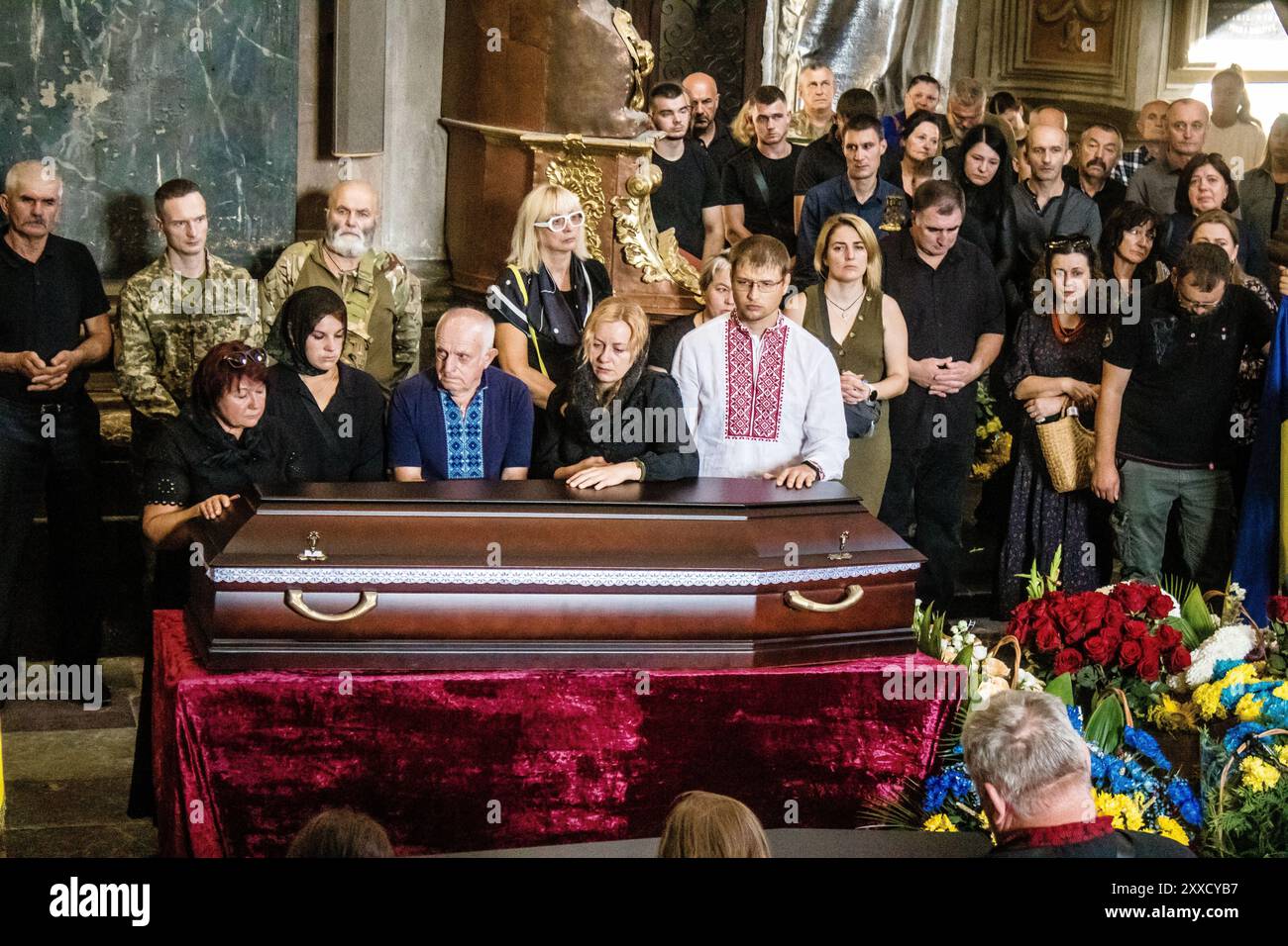 Lviv, Ukraine, August 23, 2024 Relatives are crying on the coffin ...