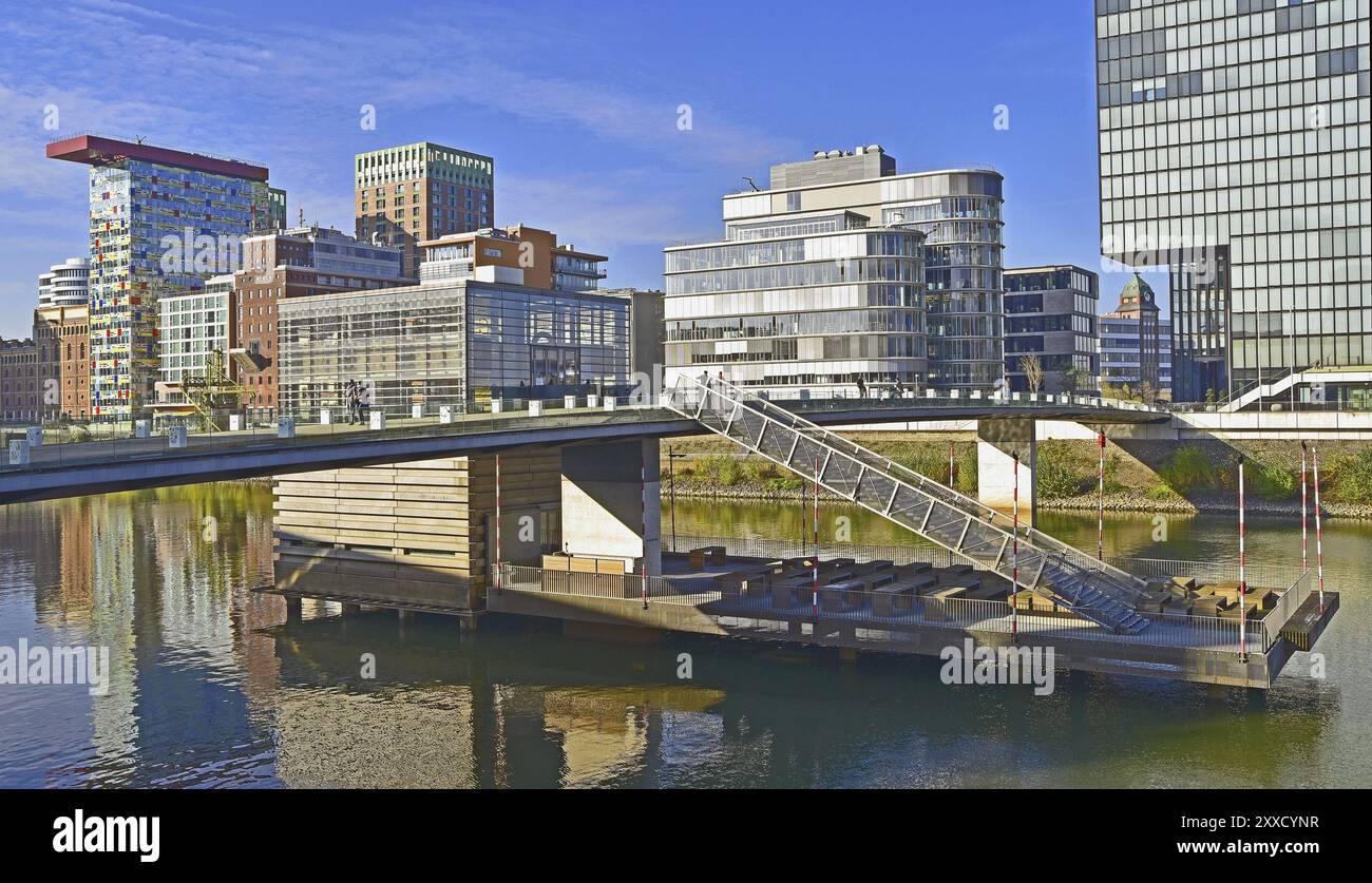 The jetty and the buildings in the media harbour Stock Photo - Alamy
