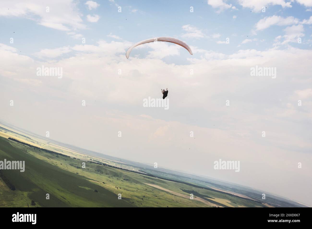 Aerial top view paraglider flies hi-res stock photography and images ...