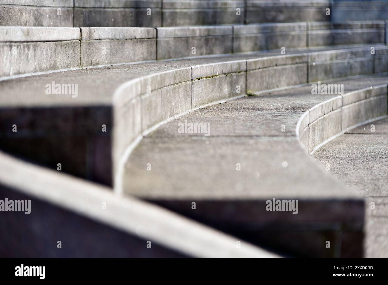 Steps of a curved stone staircase Stock Photo - Alamy