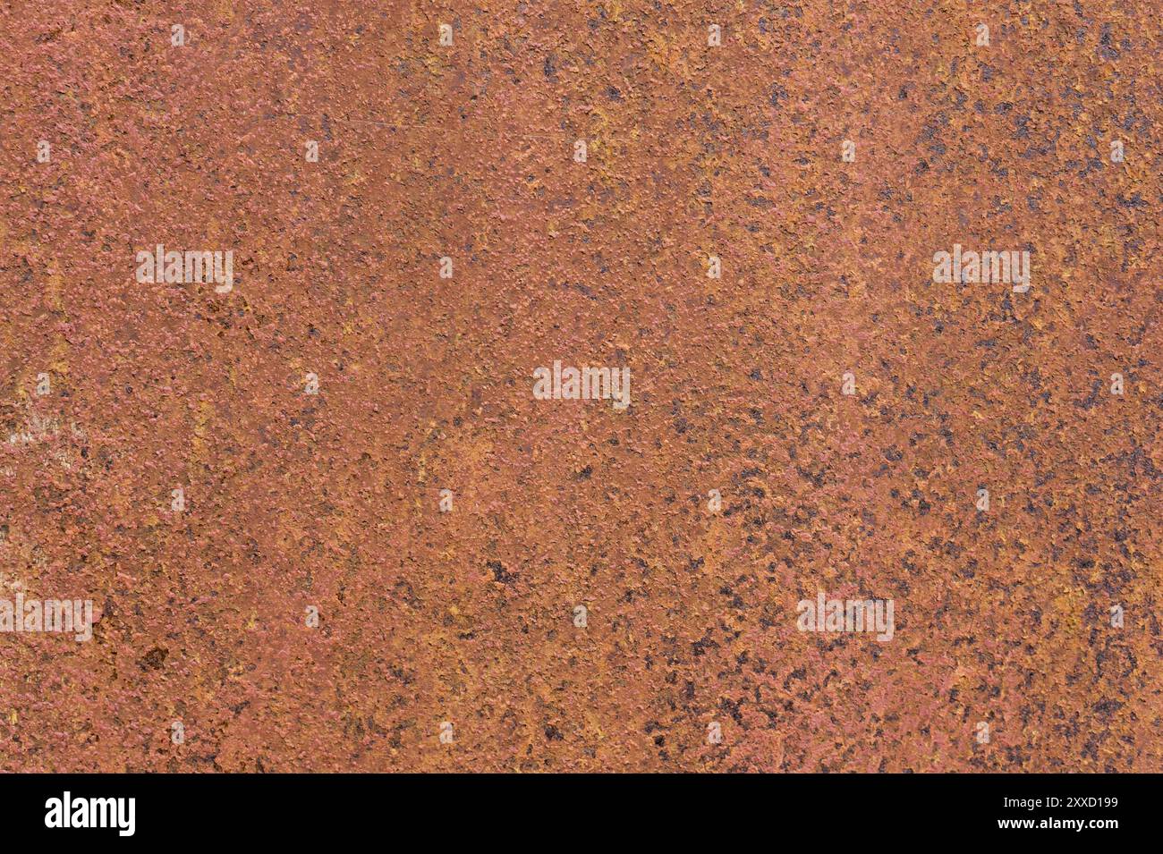 Rusty yellow-red textured metal surface. The texture of the metal sheet ...