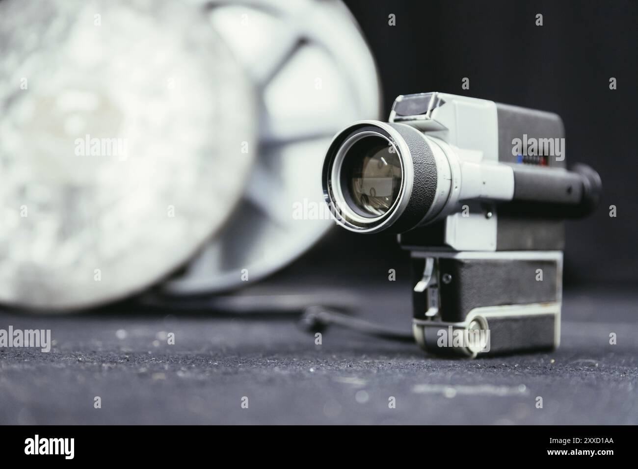 Vintage old movie camera, production studio in the blurry background ...