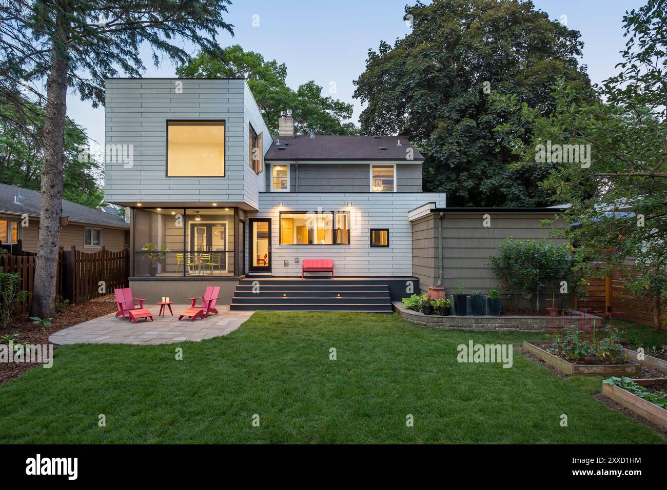 Back exterior of house showing new metal clad addition with portions of ...