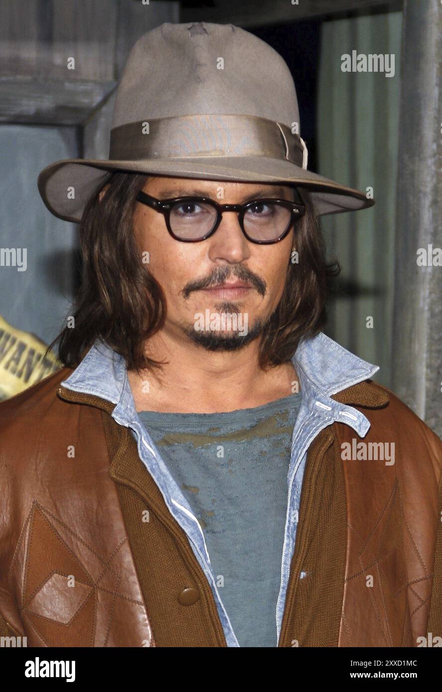Johnny Depp at the Los Angeles premiere of 'Rango' held at the Regency ...