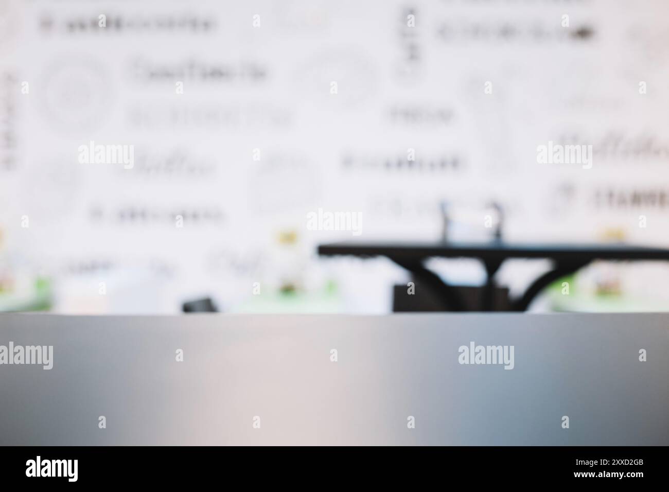 Metal tabletop blurred background Stock Photo - Alamy