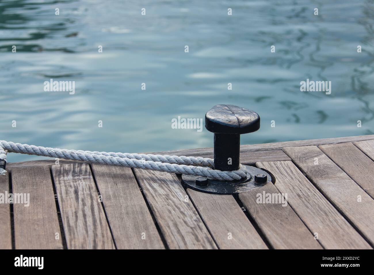 Yachting - Mooring rope tied around steel anchor Stock Photo - Alamy