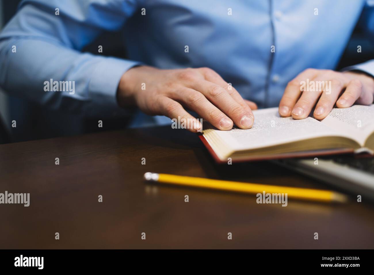 Book being read hi-res stock photography and images - Alamy