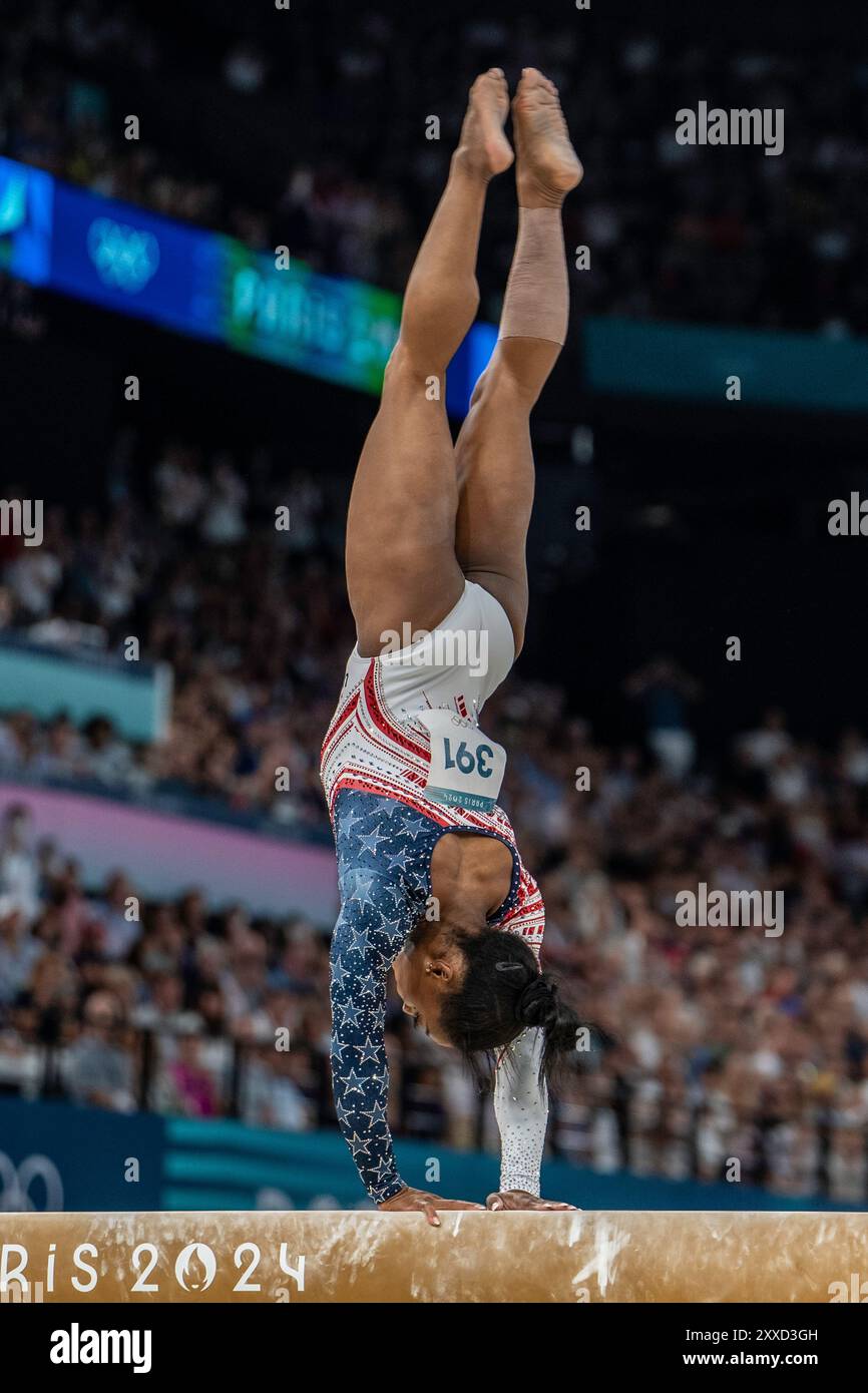 Simone Biles USA) competes on the balance beam during the Women's ...