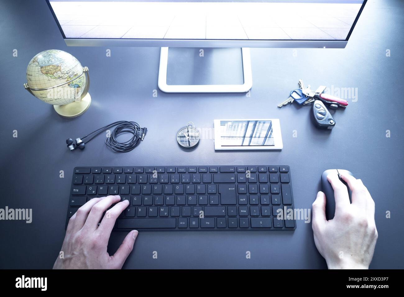 Workplace of a freelancer: Arrangement of computer, keyboard, credit ...