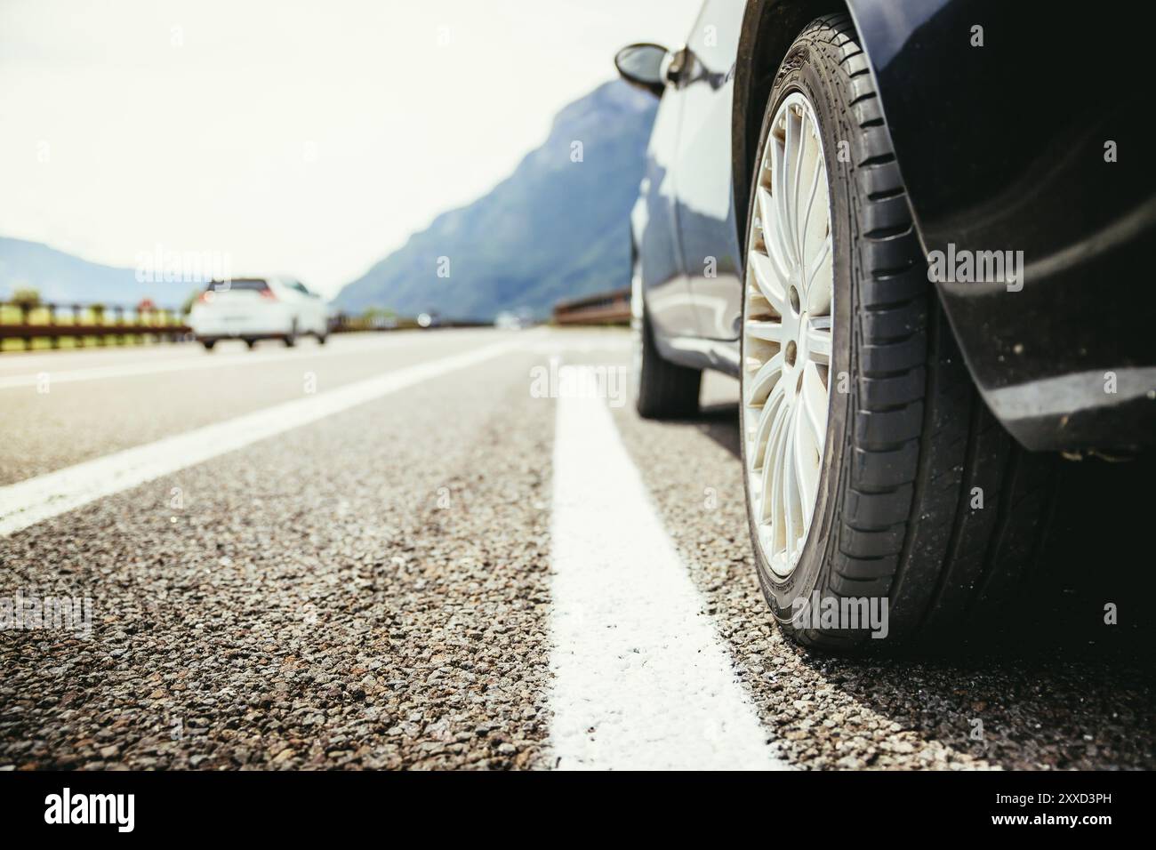 Close up of a car standing on a breakdown lane, summer vacation Stock ...