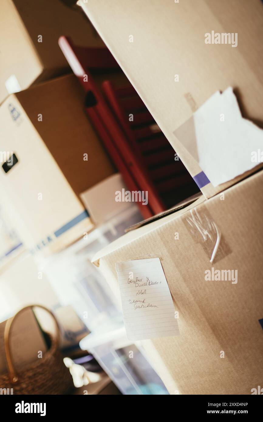 Move. Cardboard, boxes and stuff for moving into a new home Stock Photo ...