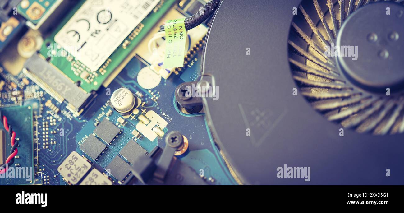 Computer cooling fan for overclocking on a circuit board, close up ...