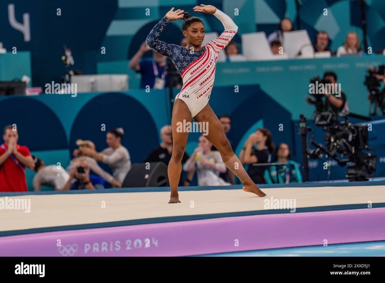 Simone Biles USA) competes on the floor exercise during the Women's ...