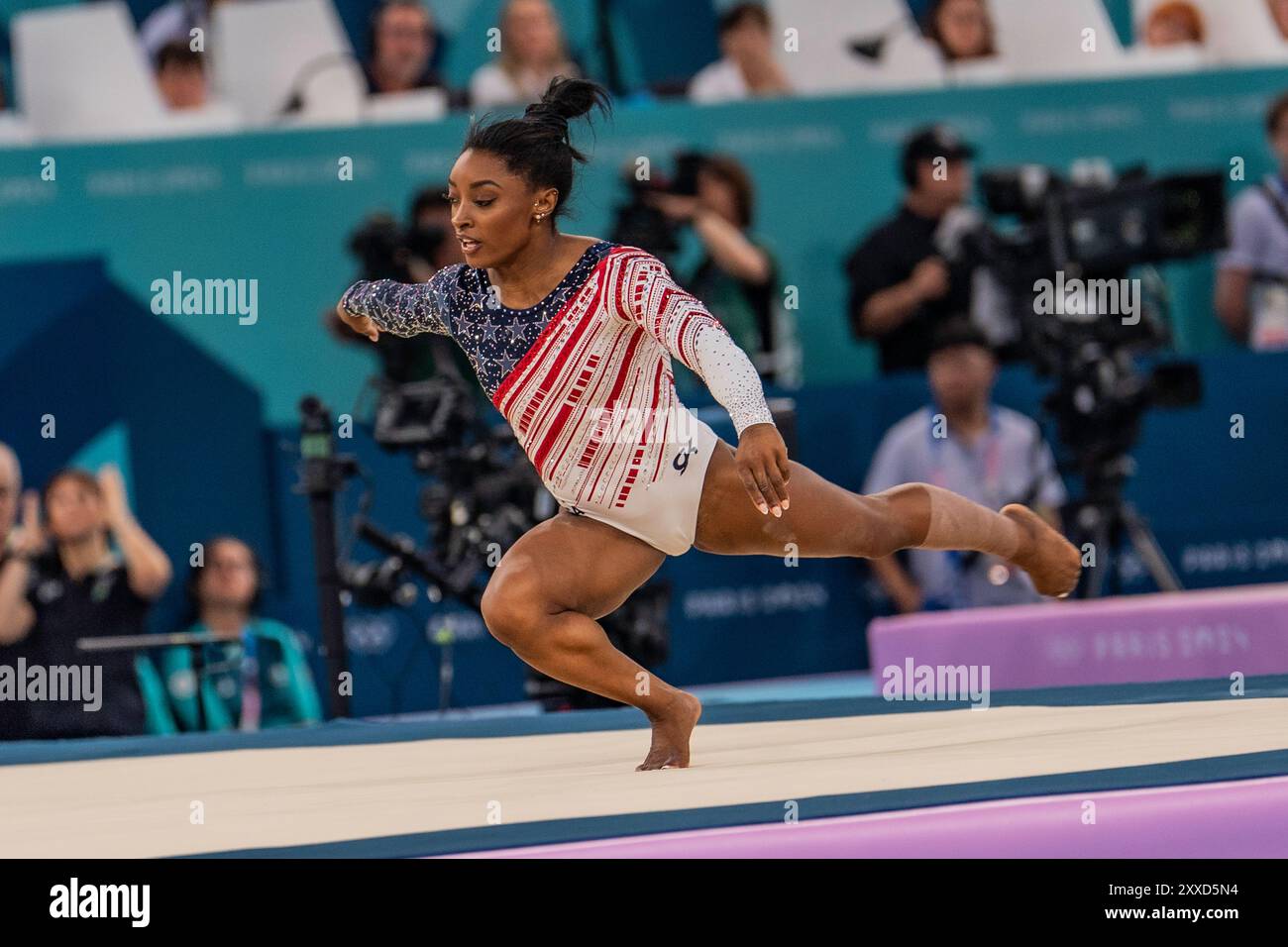 Simone Biles USA) competes on the floor exercise during the Women's ...