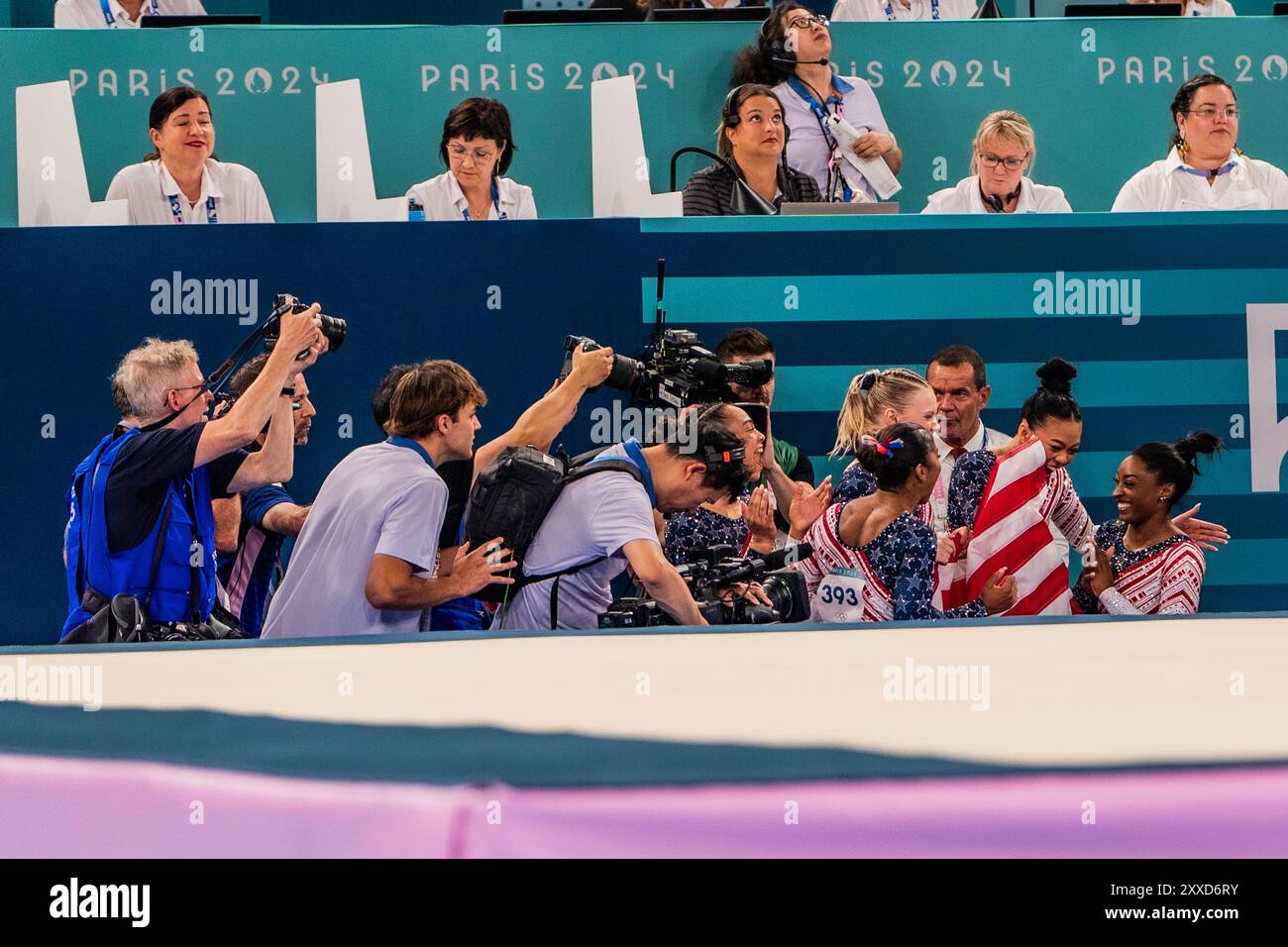 Simone Biles USA) celebrates with teammates after completing her floor ...