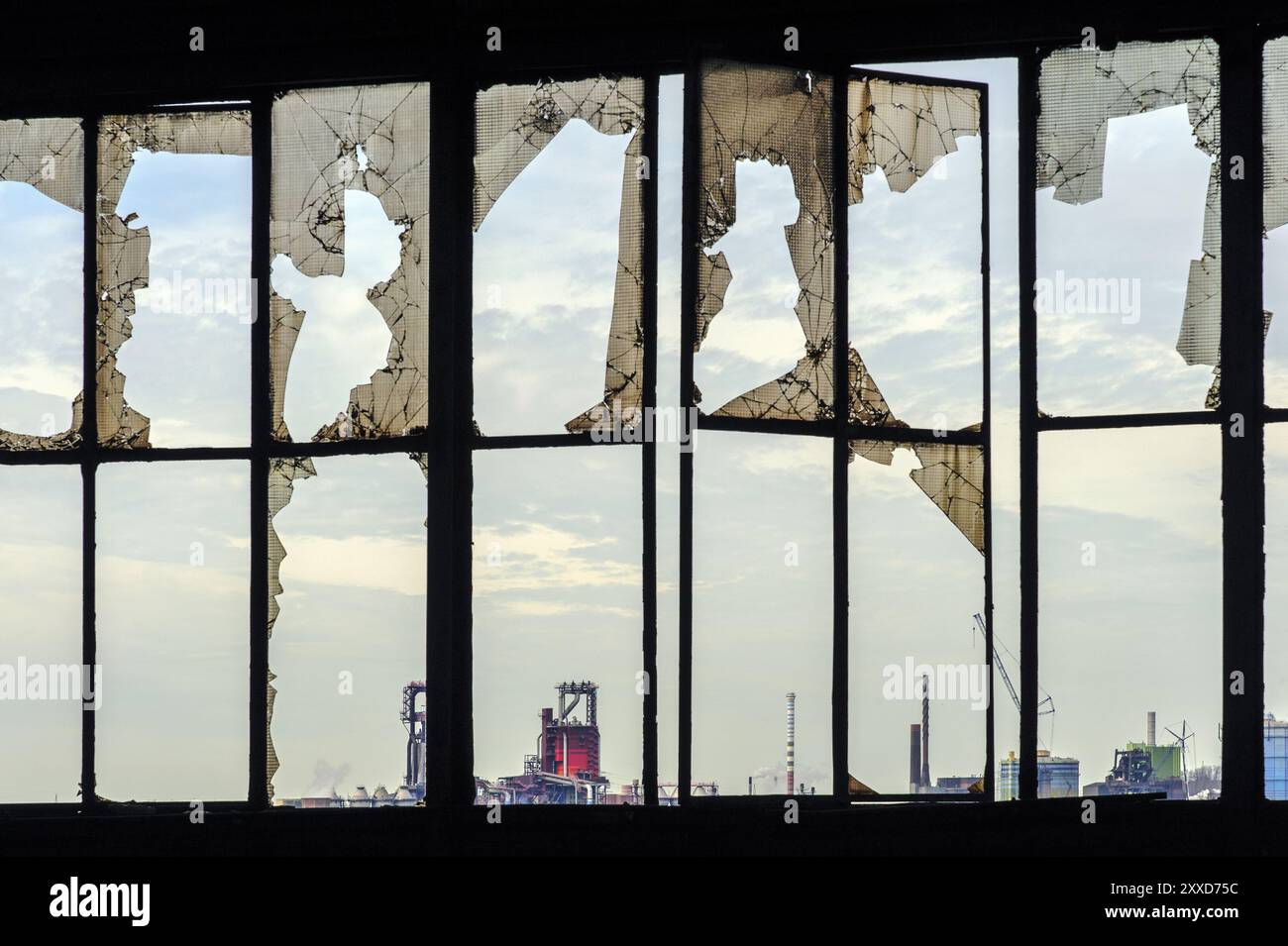 Smashed window front of an old industrial plant Stock Photo - Alamy