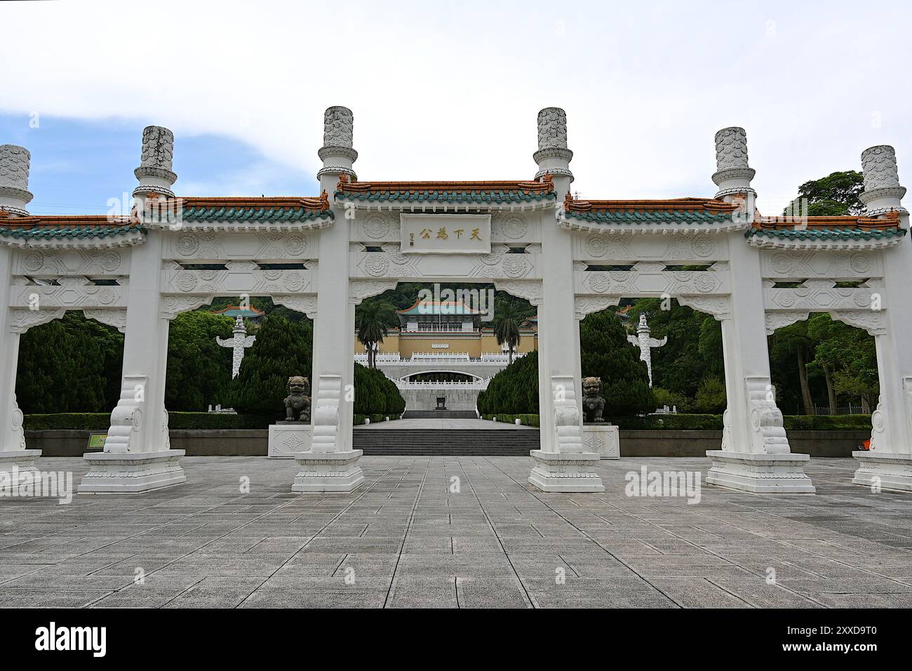 Traditional Chinese style architecture with paifang arch gateway at ...