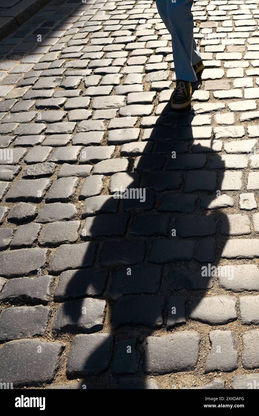 Shadow from oncoming foot Stock Photo - Alamy