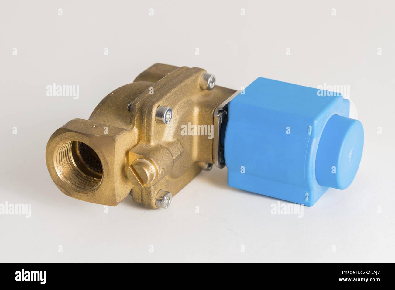 A new magnetic electro valve on a gray background. Hydraulic or ...