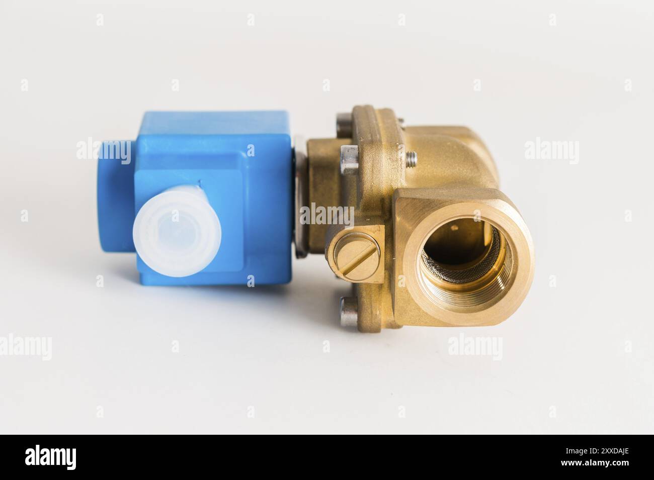 A new magnetic electro valve on a gray background. Hydraulic or ...