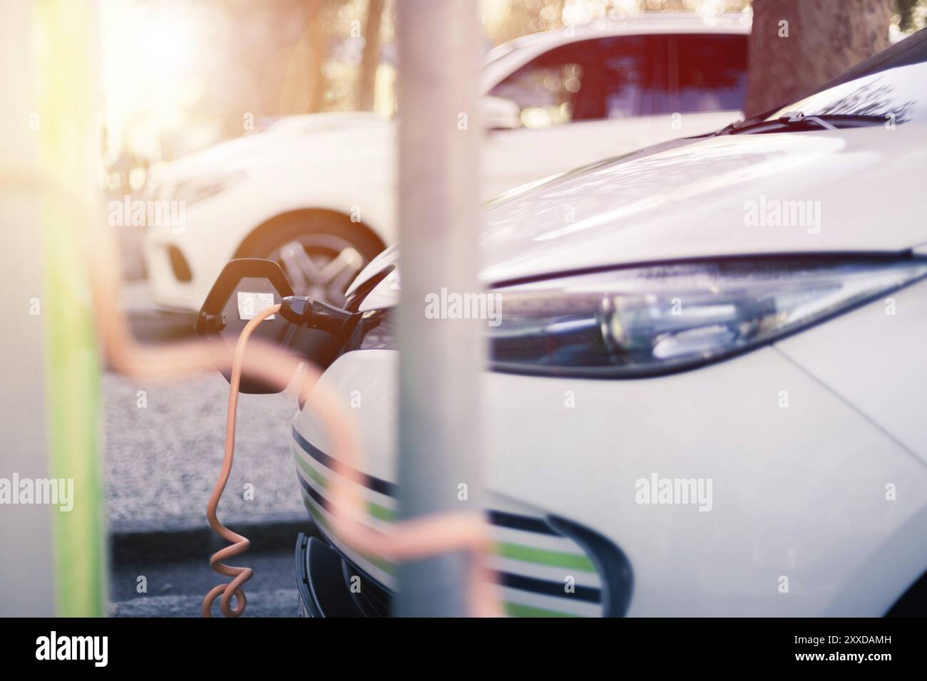 Electric car recharging with charge cable and plug leading to charge ...