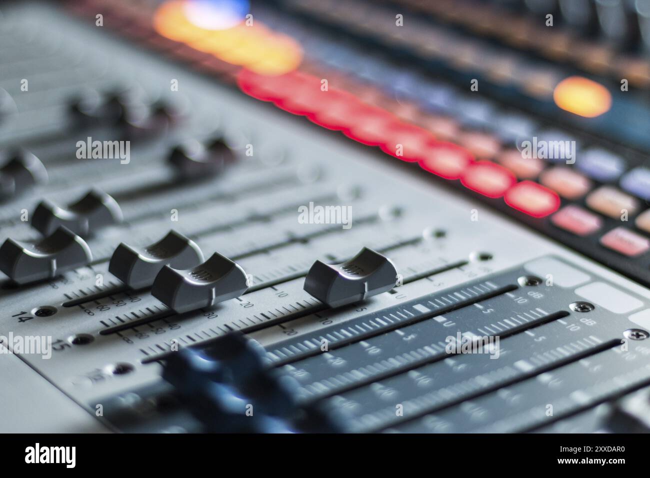 Professional music production in a sound recording studio, mixer desk ...