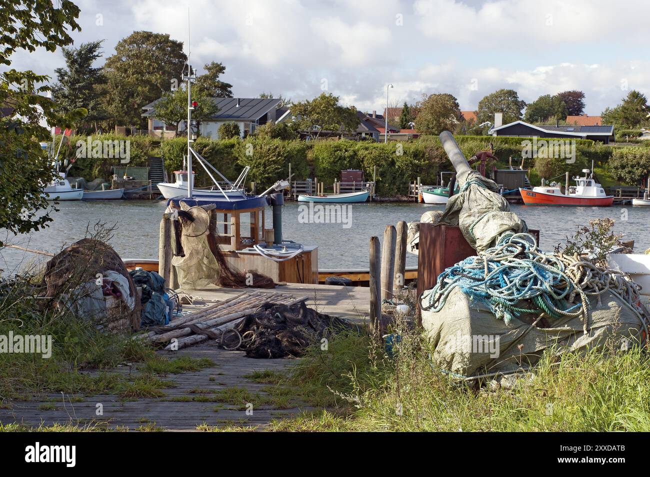 Fishing boat in the Karrebaeksminde canal Stock Photo - Alamy