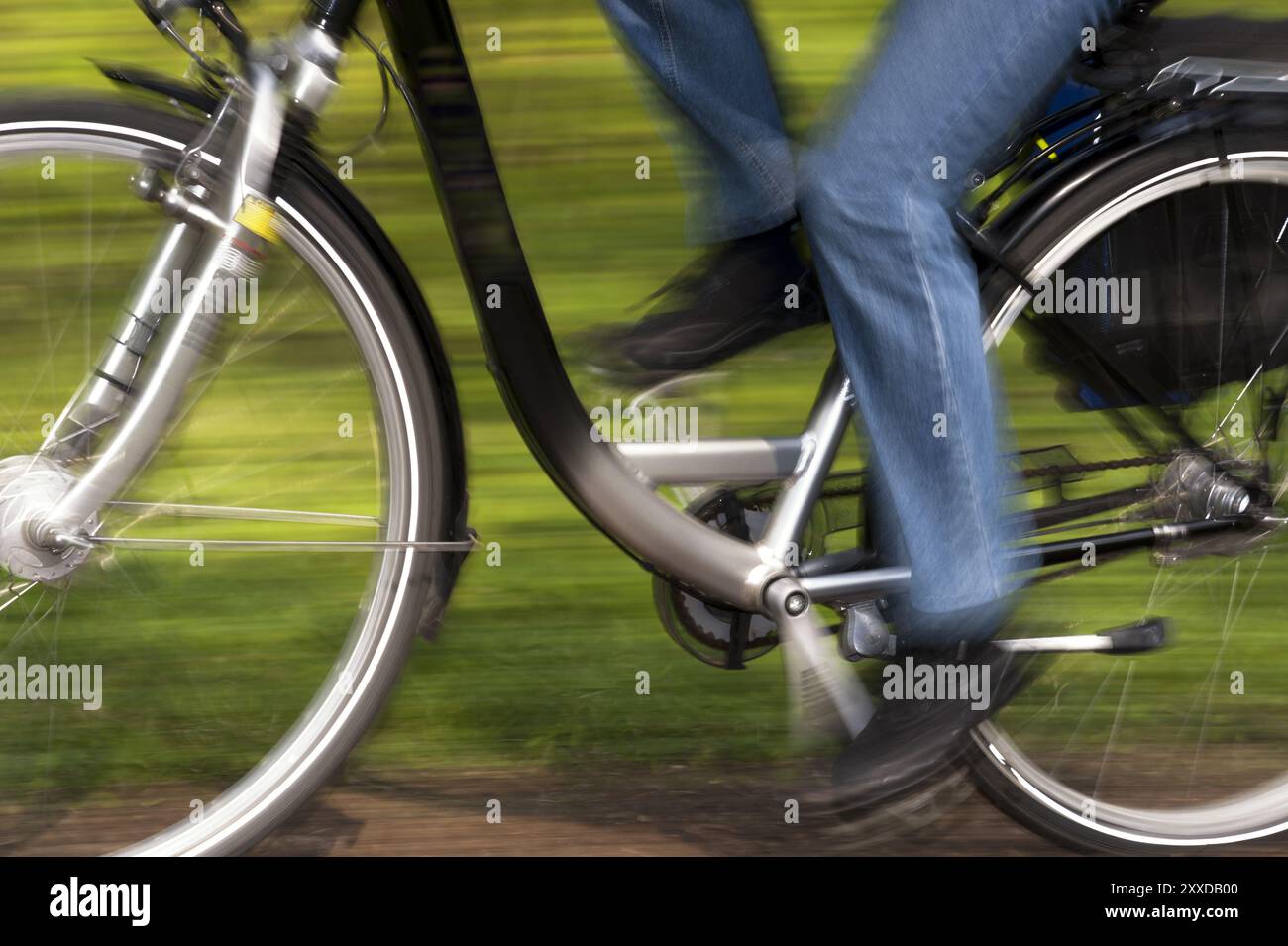 Fast moving legs of a cyclist Stock Photo - Alamy