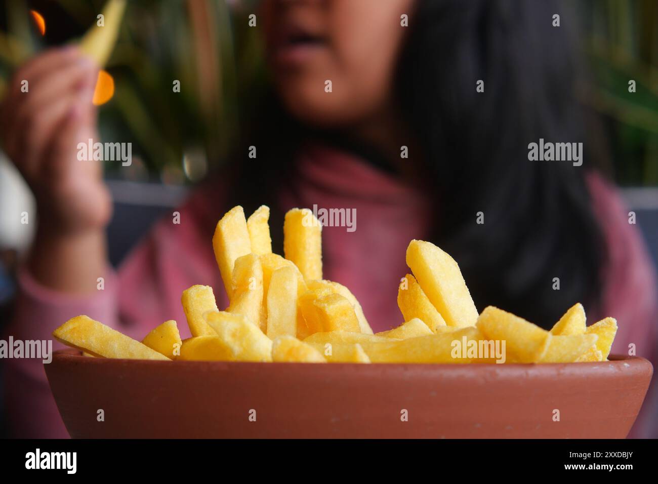child eating french fries close up Stock Photo - Alamy