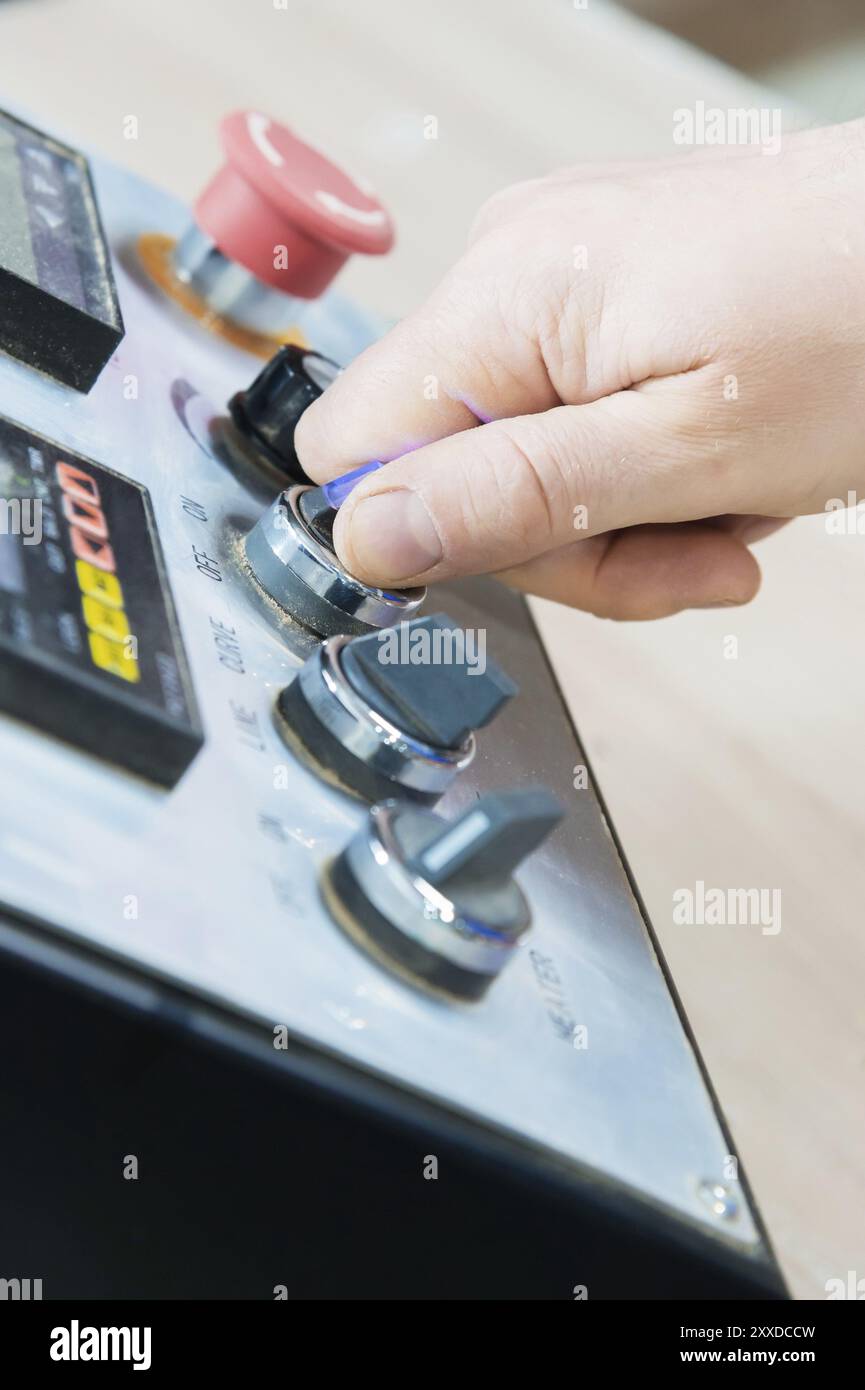 A close-up of the real male carpenter's not well-groomed hands ...