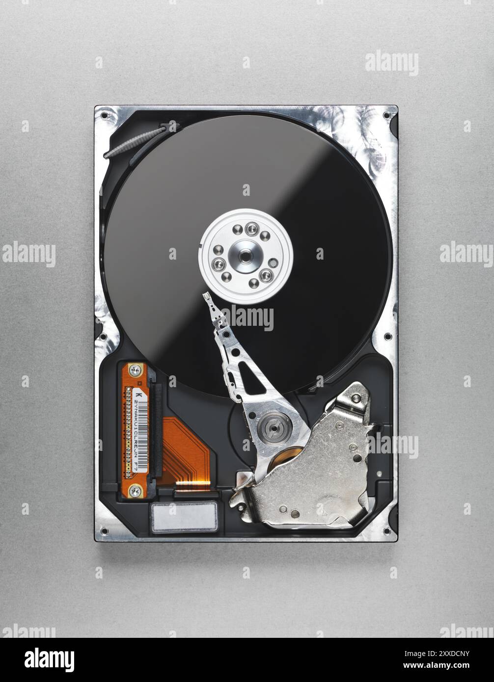Open computer hard disk drive HDD isolated on metallic background Stock ...