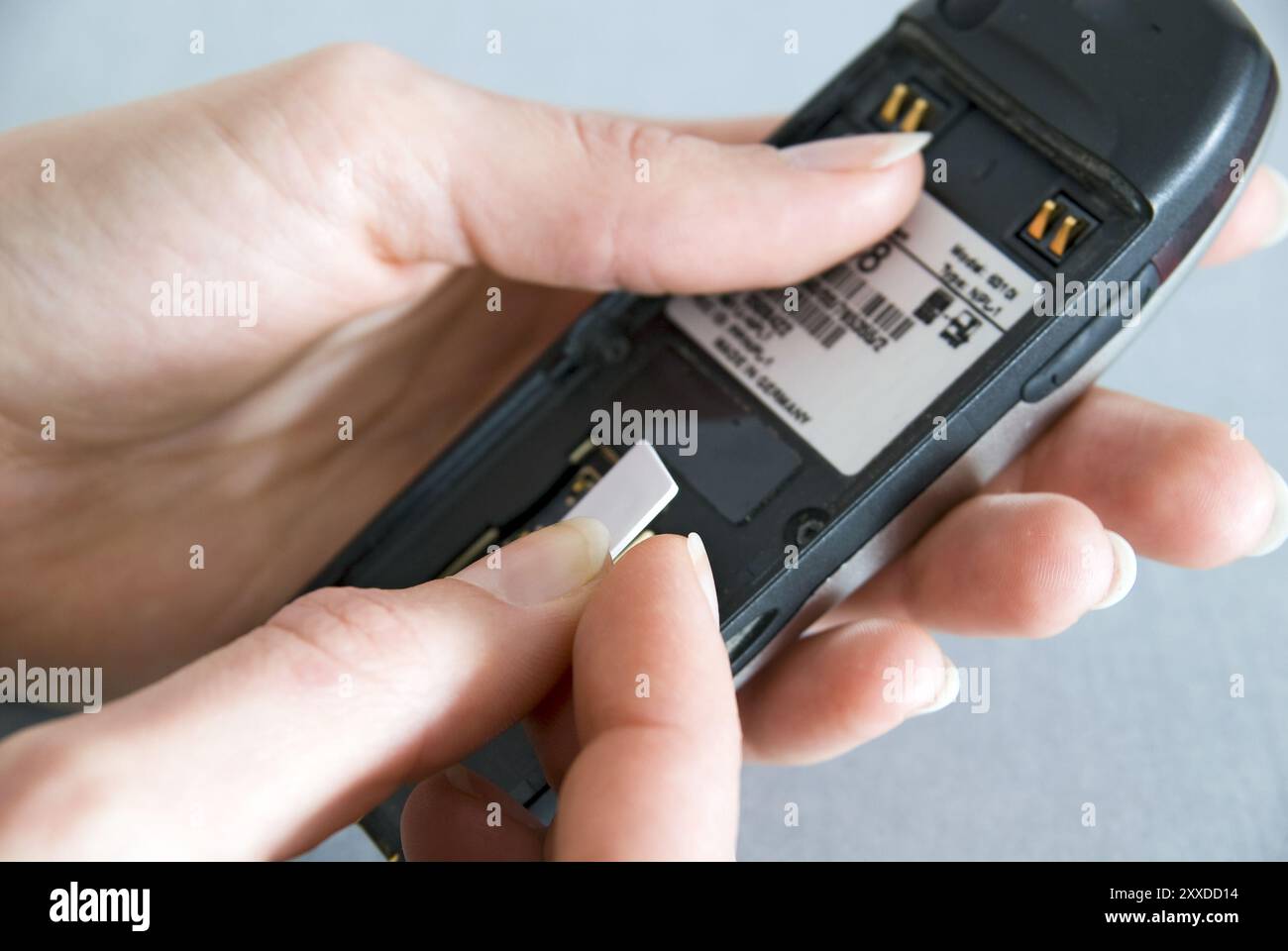 Hand inserts hi-res stock photography and images - Alamy