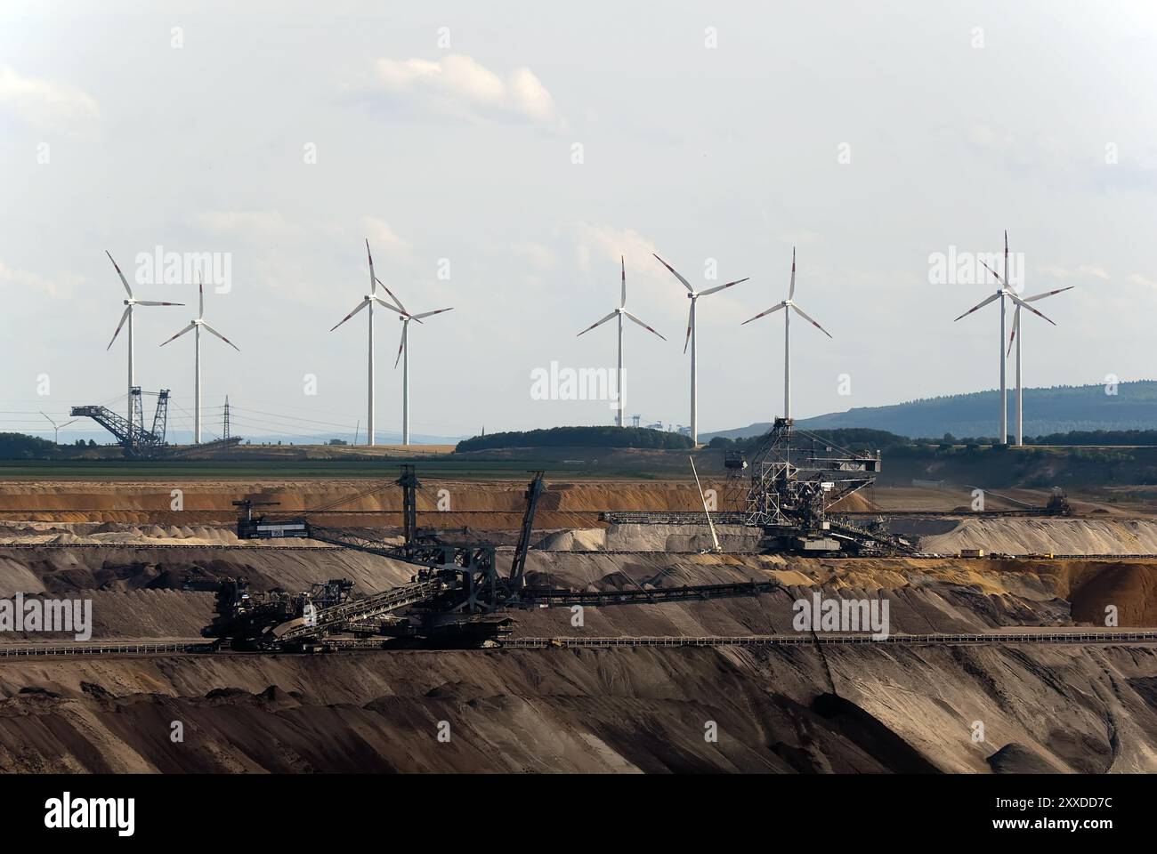 Wind turbines and open-cast mining Stock Photo - Alamy
