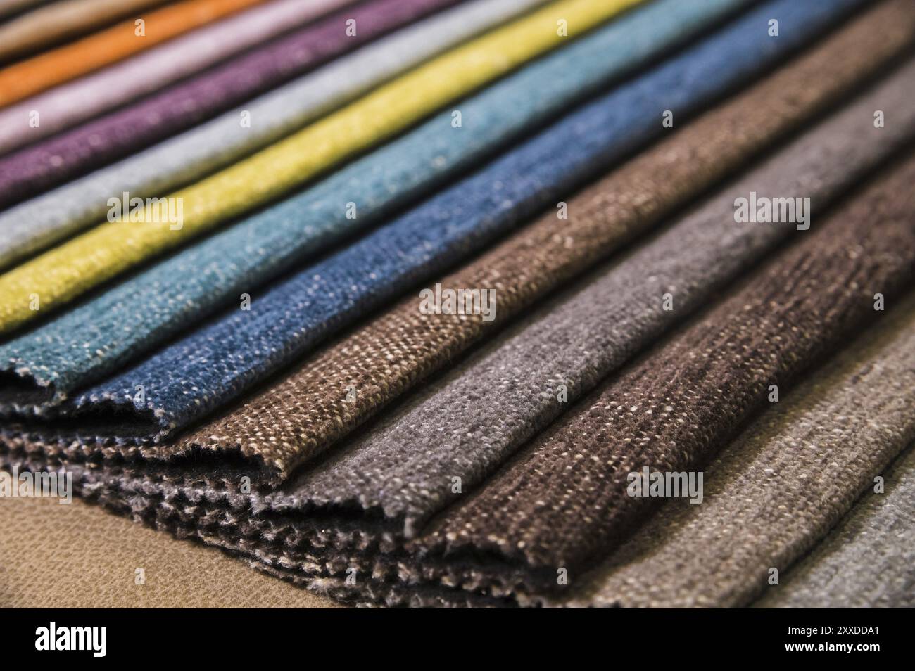 Colorful and bright fabric samples of furniture and clothing upholstery ...
