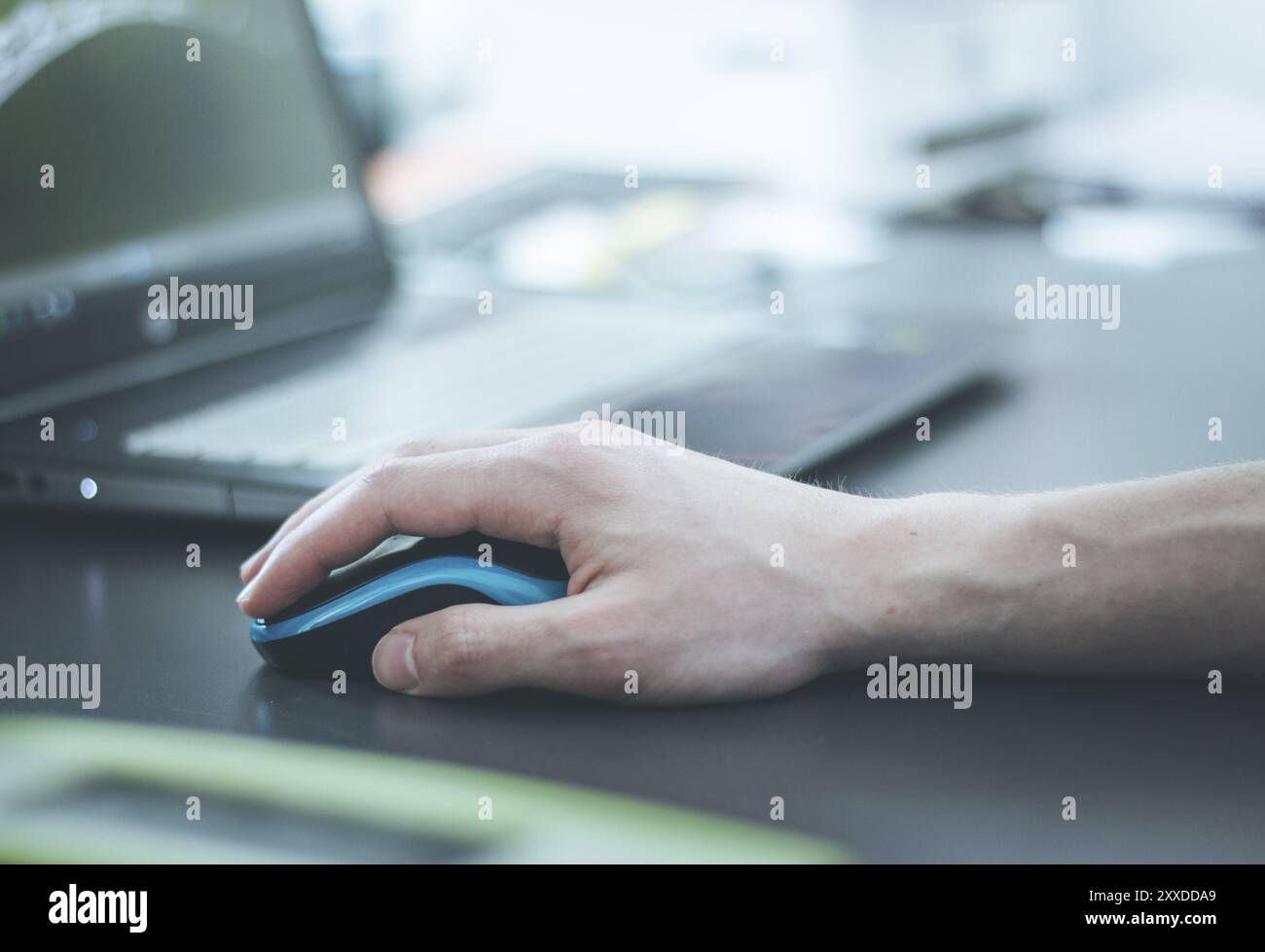 Close up of computer mouse used by a male hand Stock Photo - Alamy