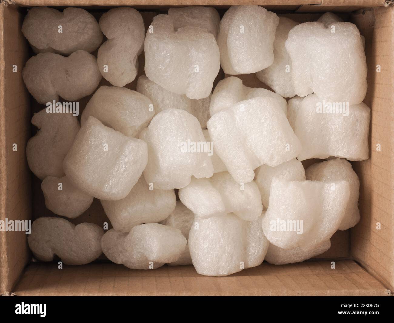 Close up of a cardboard box with styrofoam fill, protection concept ...
