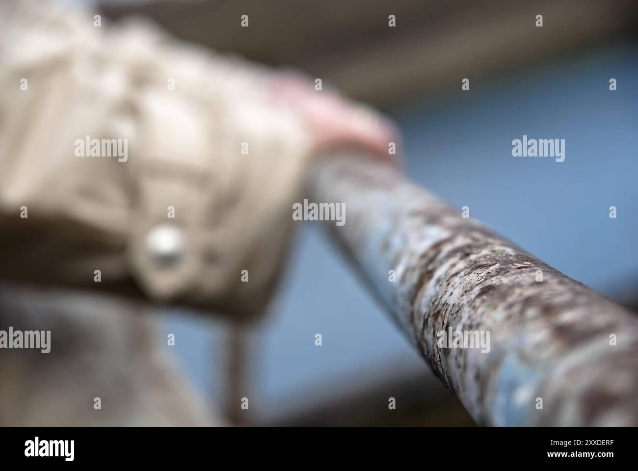 Hand on the railing Stock Photo - Alamy