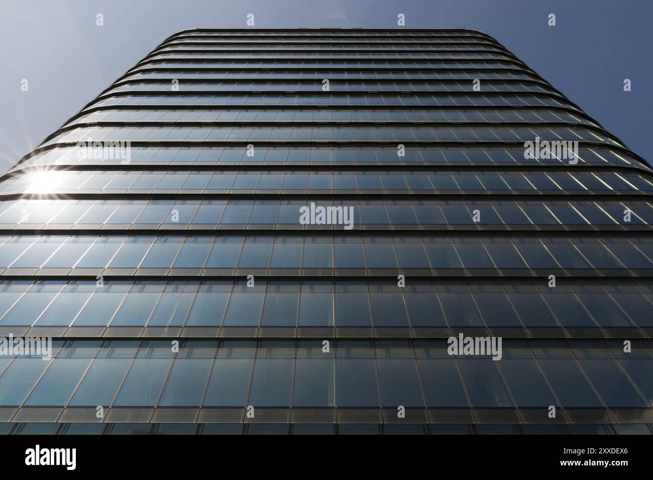 Window front of an office building with light reflection in Duesseldorf ...
