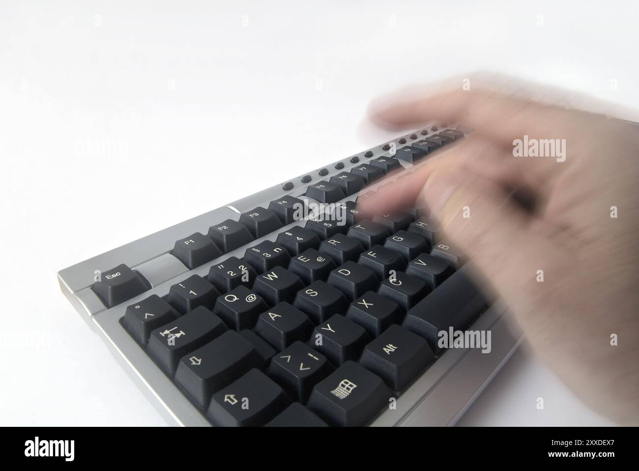 PC keyboard with hand Stock Photo - Alamy